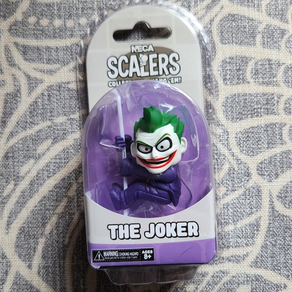 DC Comics | Toys | Neca Scalers The Joker Collect Em Hang Em On ...